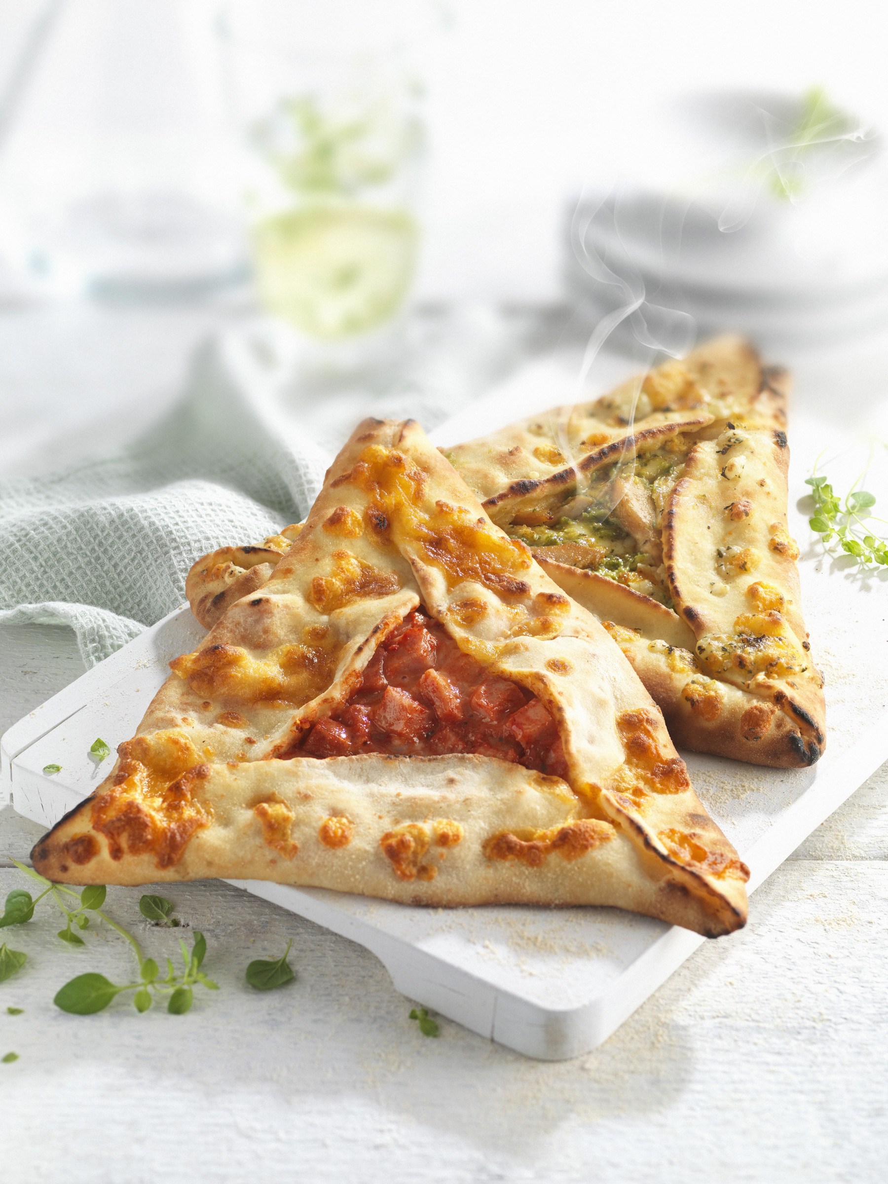 Triangle Pizza with Mozzarella Pesto and Sundried Tomato
